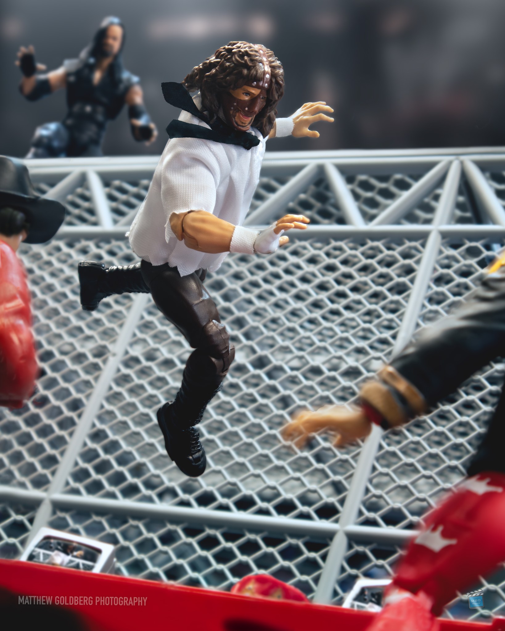 The Undertaker Tosses Mankind Off of the Hell In A Cell in Figure ...